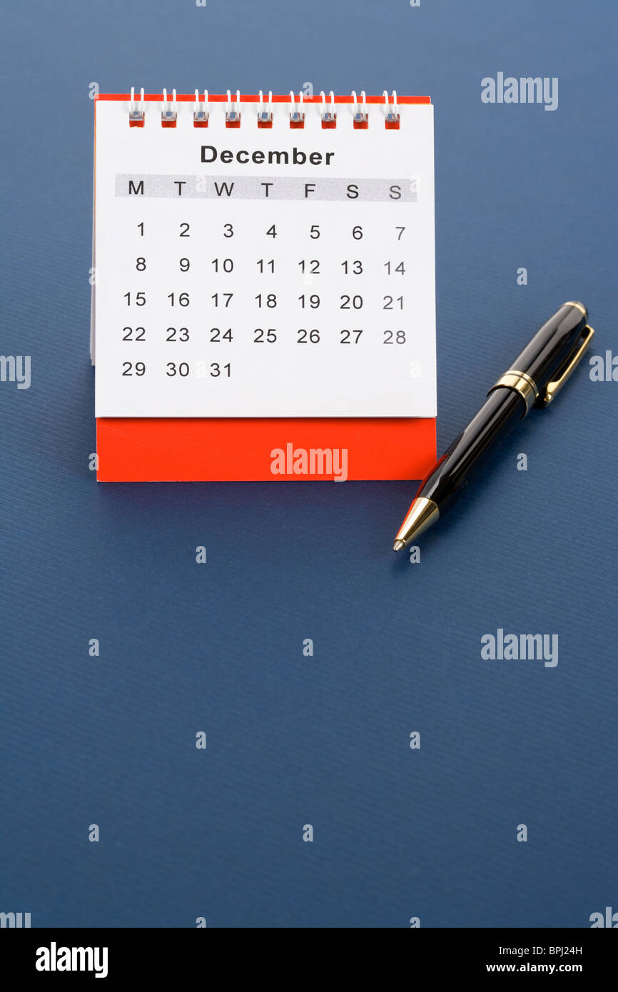 Calendar December close up with blue background Stock Photo - Alamy