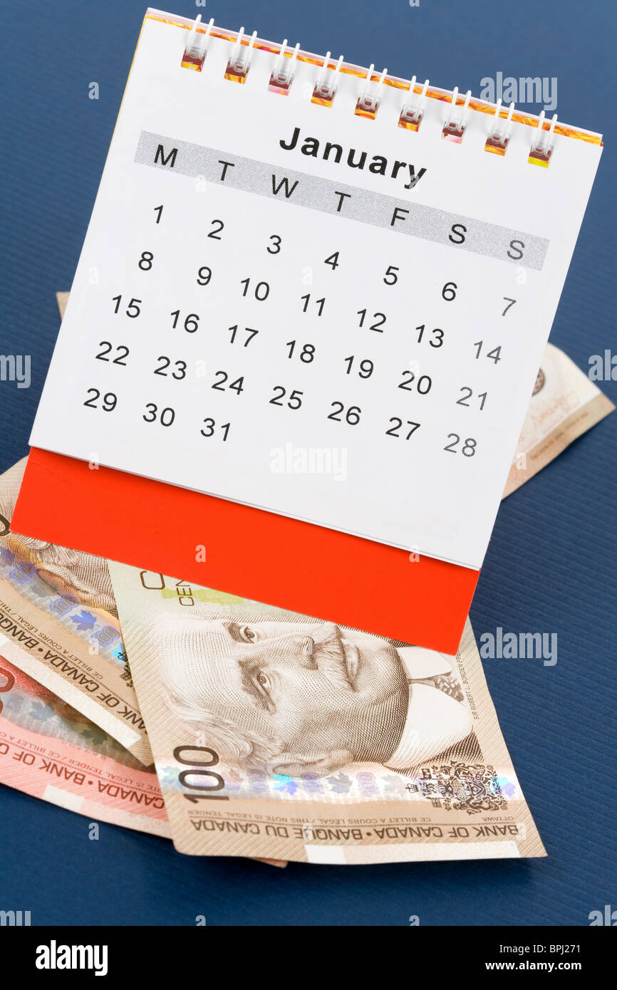 Calendar and Canadian dollar, January, New Year Stock Photo - Alamy