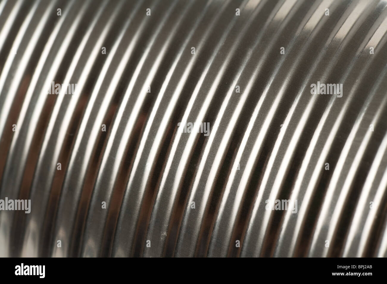 Tin container close up shot for background Stock Photo - Alamy