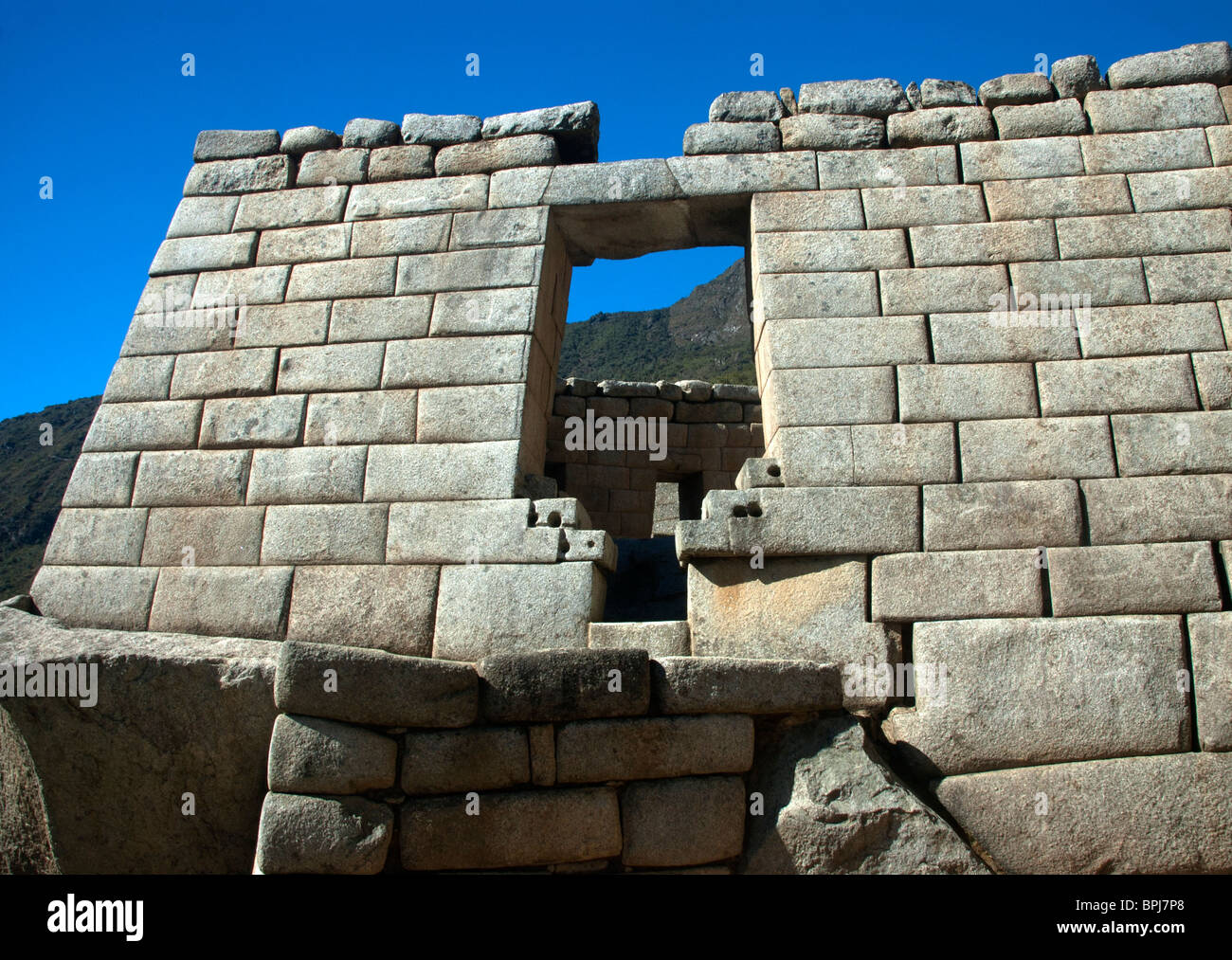 Intricate stonework of a ruined building at the ancient Incan city of ...