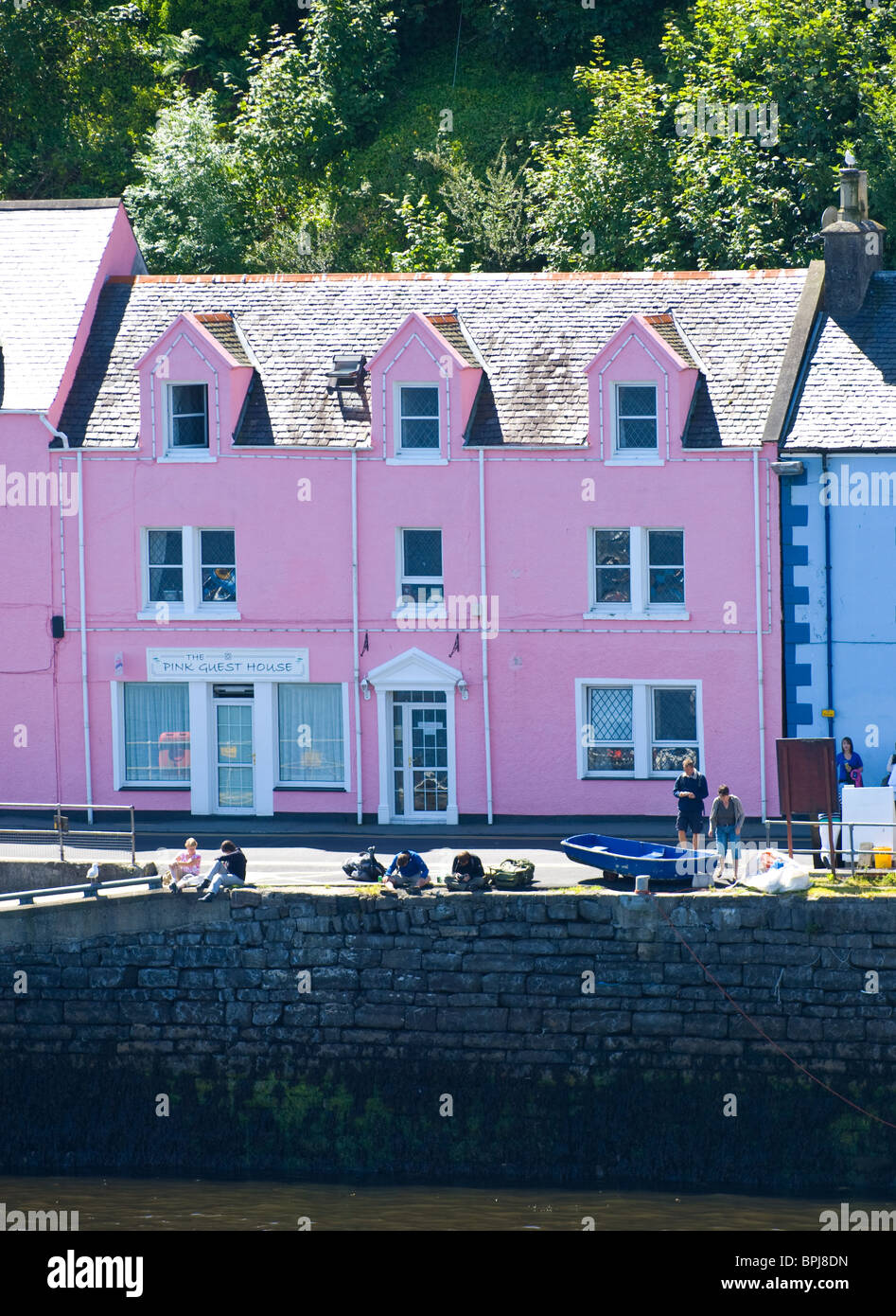 Painted buildings at the main harbor, Portree, Isle of Skye, Scotland ...