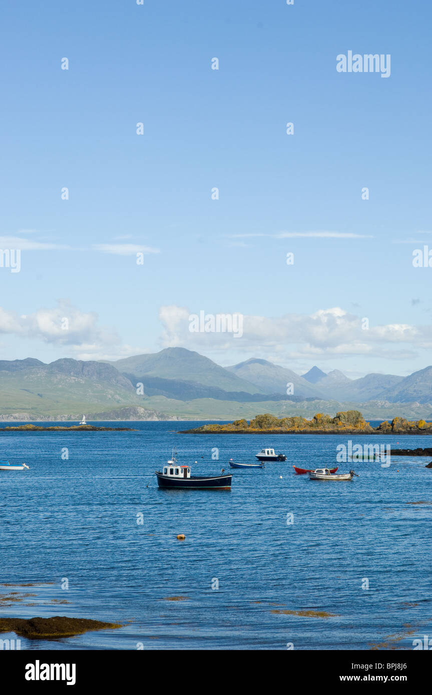 Small fishing boats anchored in Ardvasar harbor, Isle of Skye Scotland ...
