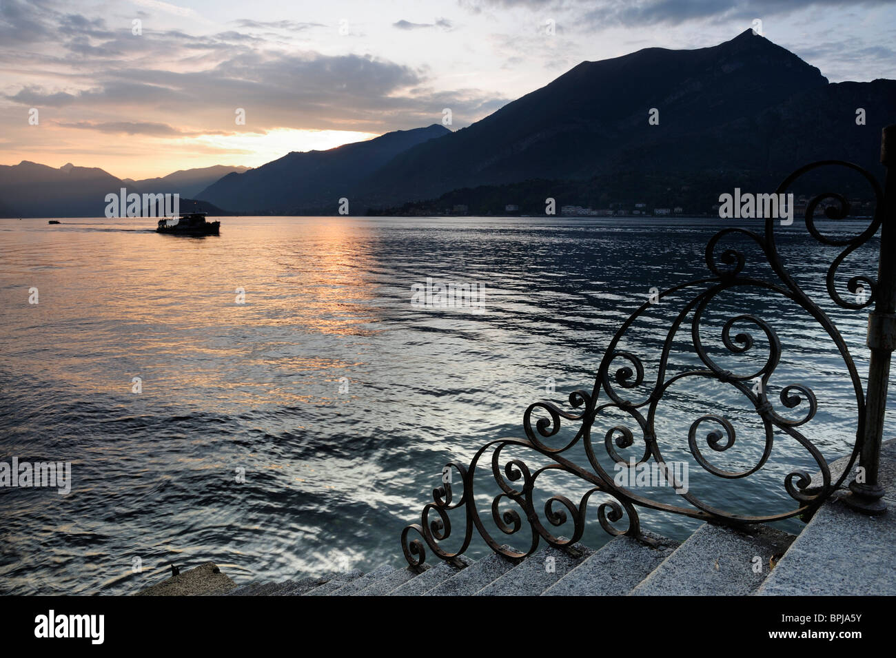 Stairs with wrought-iron balustrade at Lake Como, Lombardy, Italy Stock ...