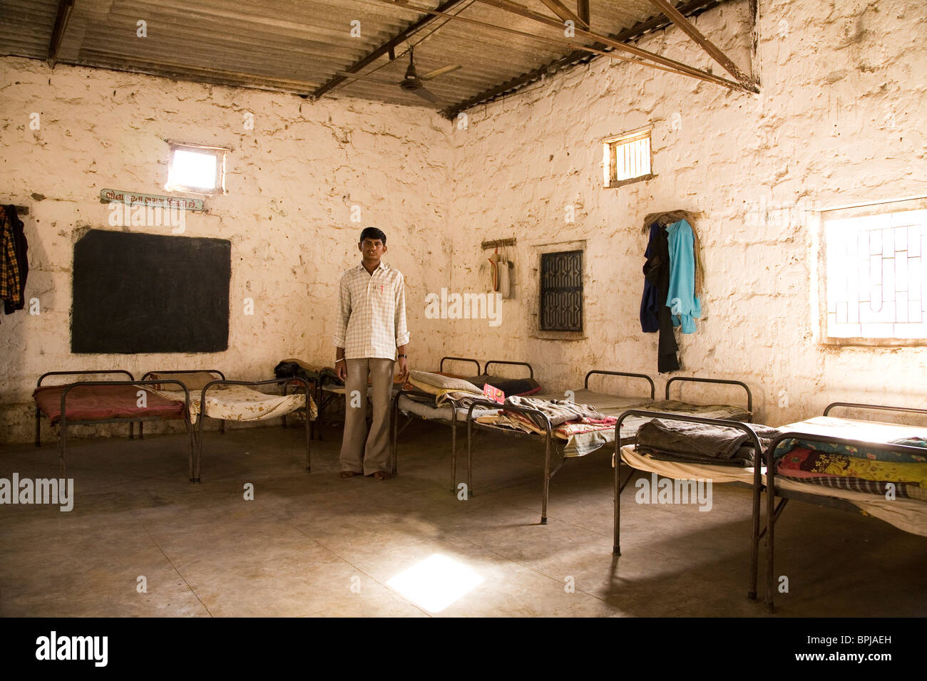 A youth shows off the accommodation in the residential school for ...
