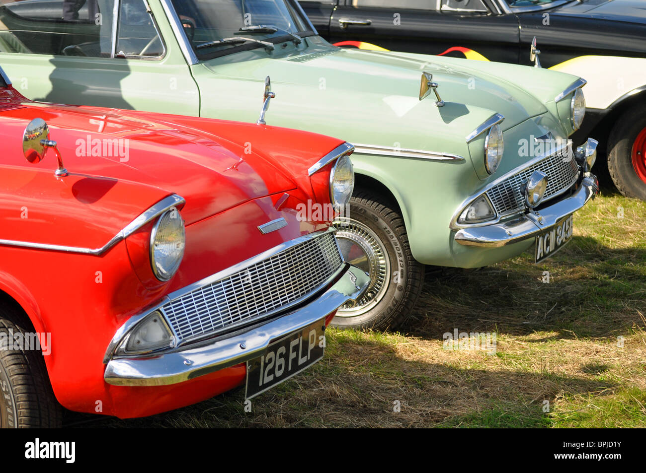 Restored Ford Anglia 105E cars at a rally Stock Photo - Alamy