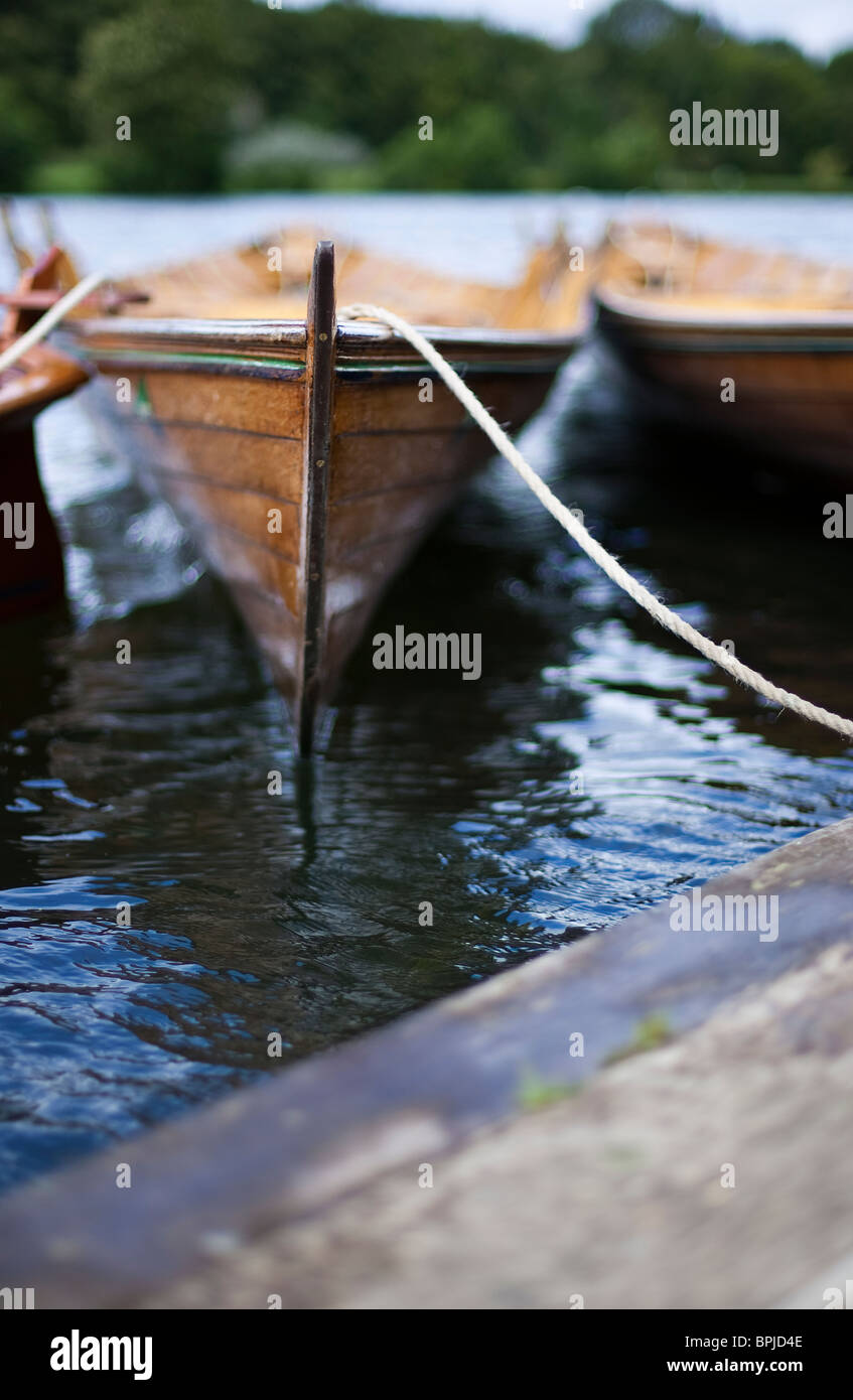 3 shiplap built wooden boats, with the focus drawing your eye to the ...