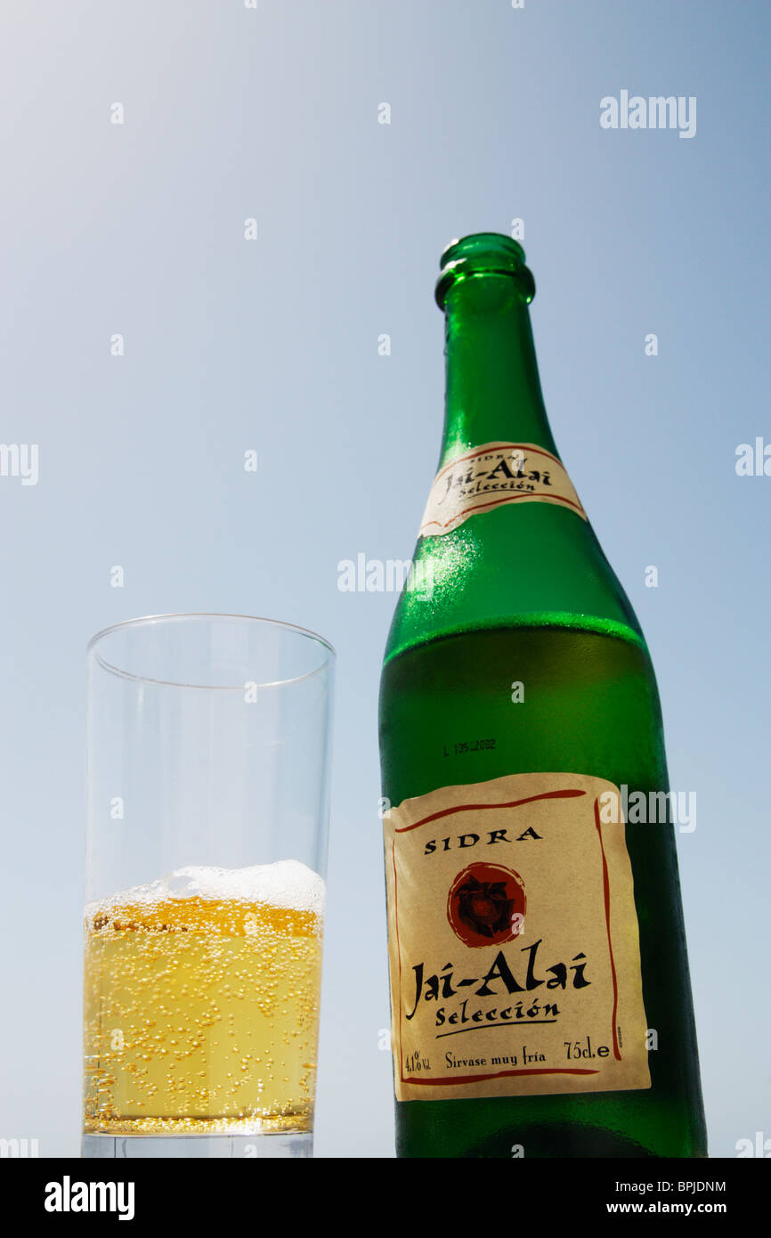 Bottle and glass of Sidra (cider) in street bar in northern Spain Stock ...