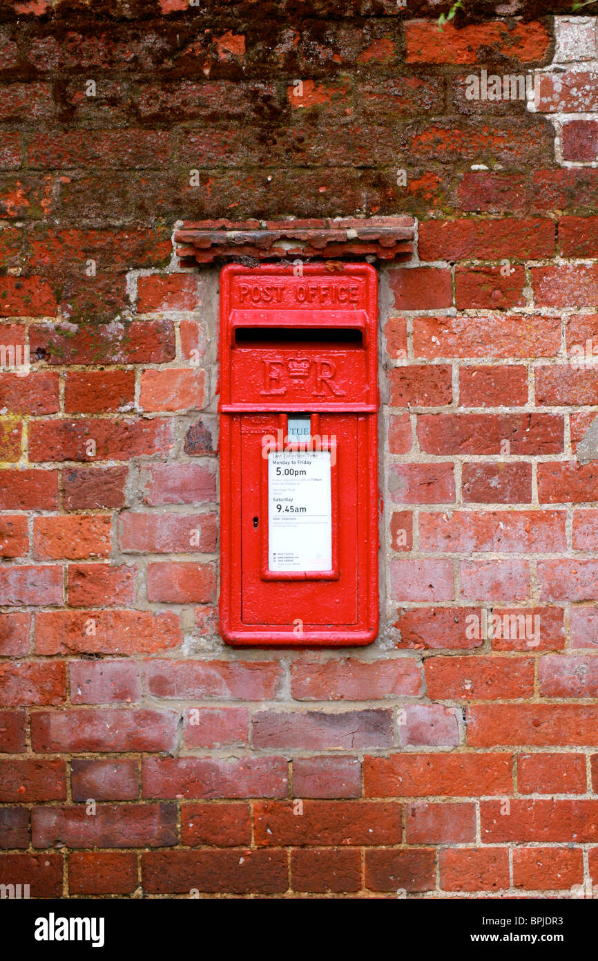 Red letter box in a red brick wall Stock Photo - Alamy