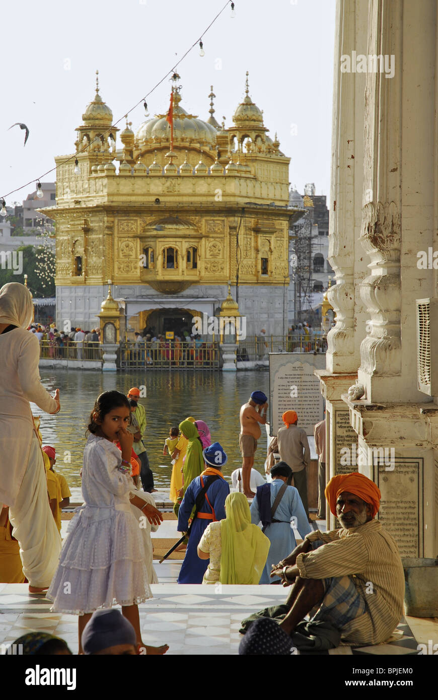 Pilgrims in front of the Golden Temple, Sikh holy place, Amritsar ...