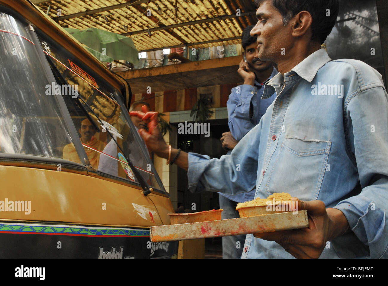 Brahmin blessing motor rickshaw at Bangalore, Karnataka, India, Asia ...
