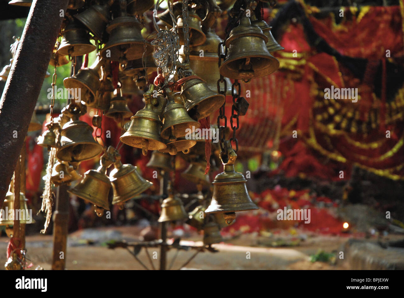 Bells at local holy site in the forest, Tribal region in Koraput ...