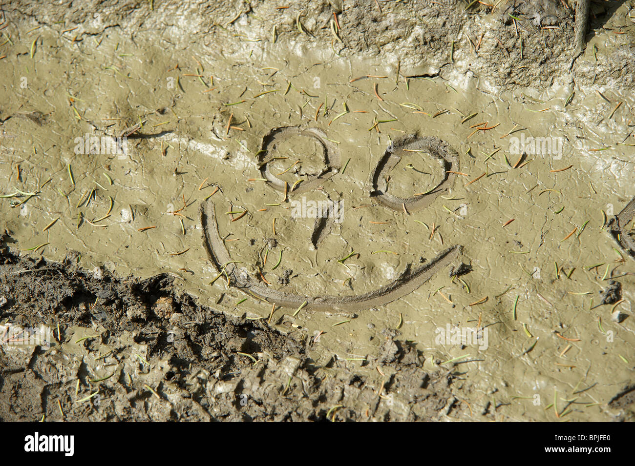 Faces imprint in mud Stock Photo - Alamy