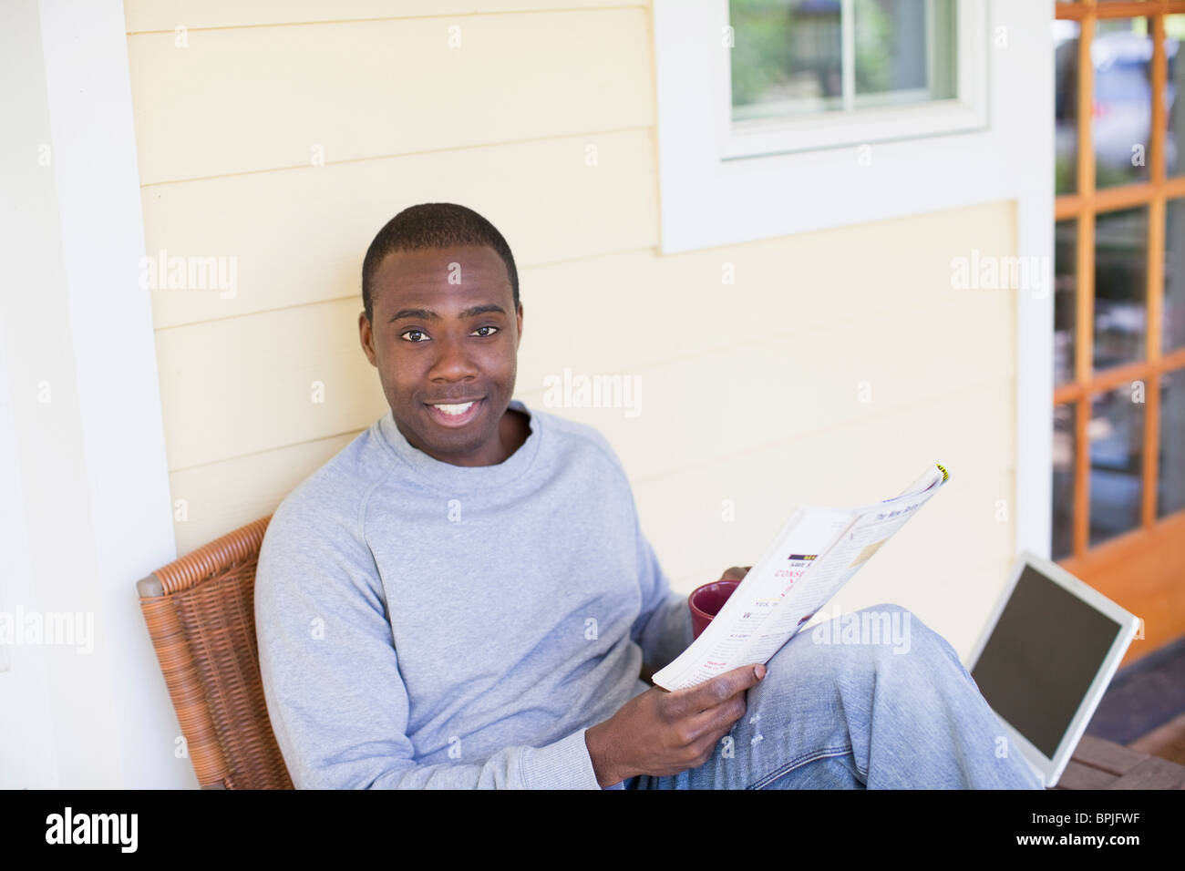 Black Man Reading Magazine