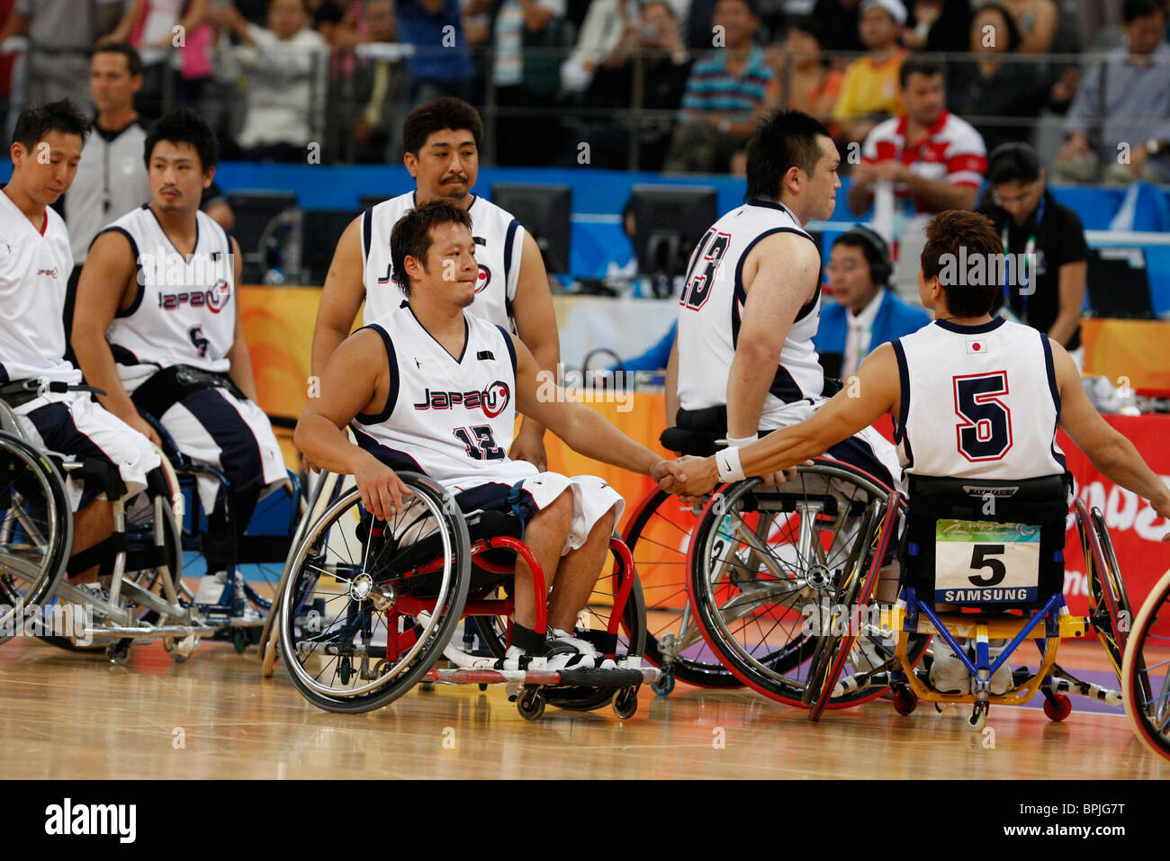 Japanese team in men's wheelchair basketball action during preliminary ...