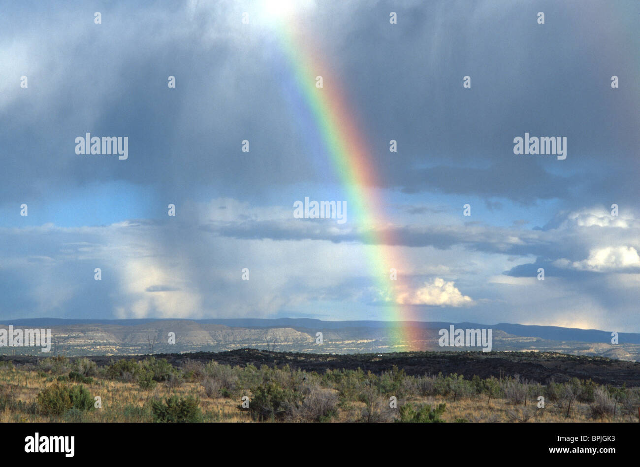 Rainbow over a canyon in western Colorado Stock Photo - Alamy