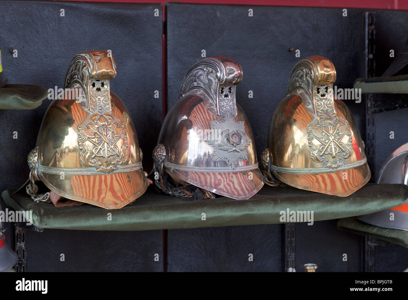 antique fire brigade helmets Stock Photo - Alamy