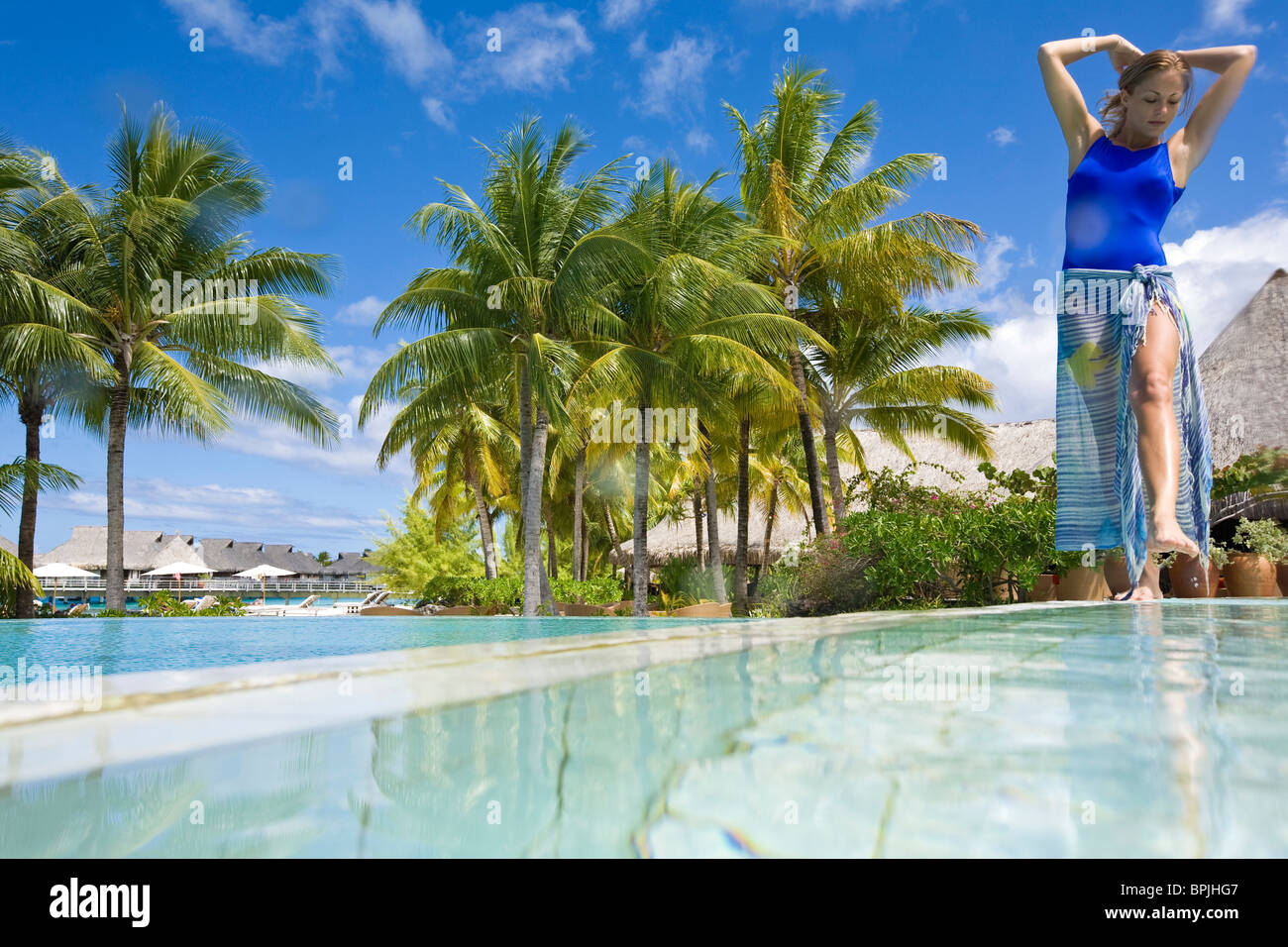 South Pacific, Bora Bora, Female tourist poolside. (PR/MR Stock Photo ...