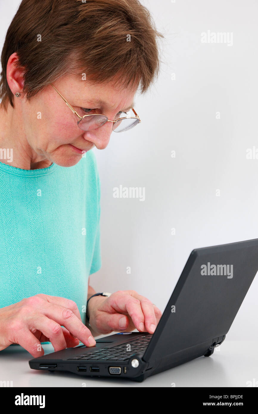 Older woman working uk hi-res stock photography and images - Alamy