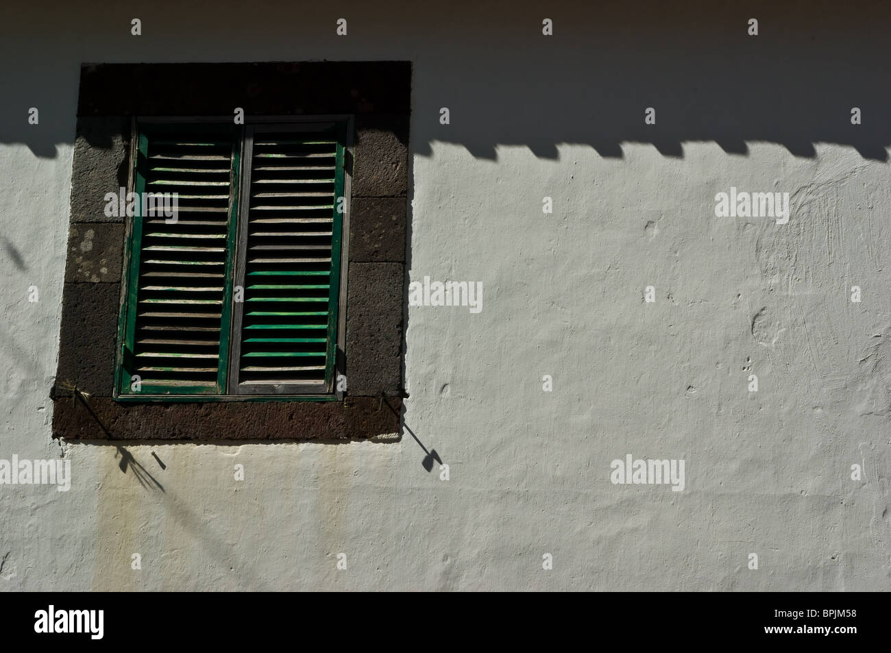 White wall with closed window Stock Photo - Alamy