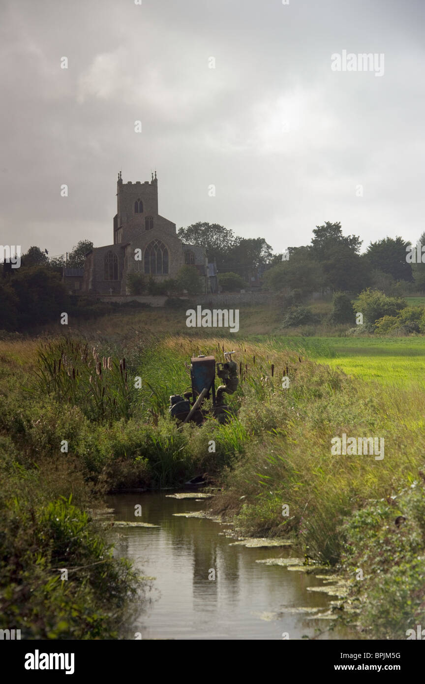 Wiveton Parish Church viewed from Cley over the fields Stock Photo - Alamy