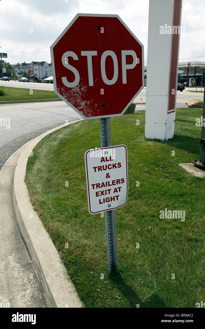 Stop sign. All Trucks and Trailers exit at light. America Stock Photo ...