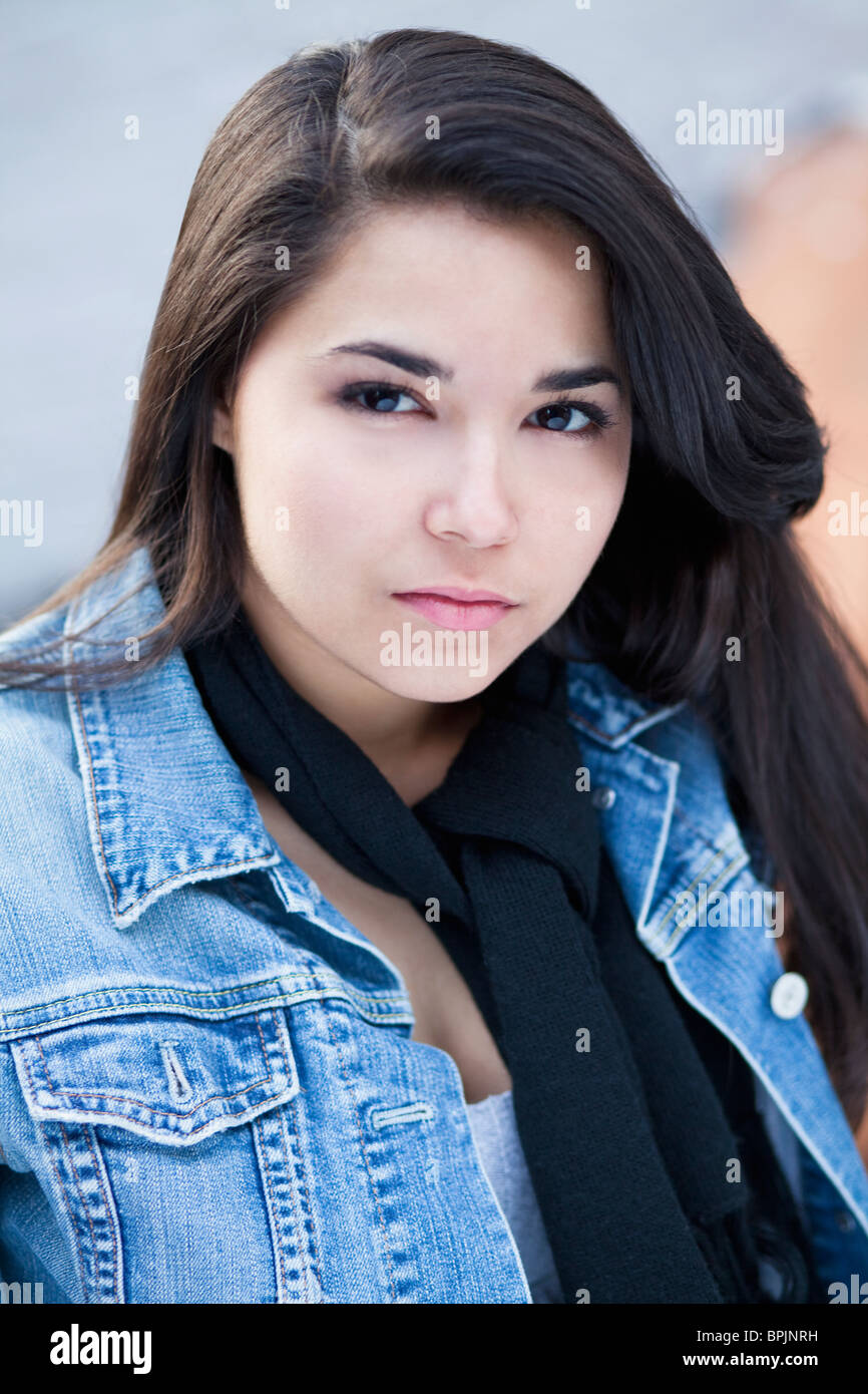 Serious Hispanic woman Stock Photo - Alamy