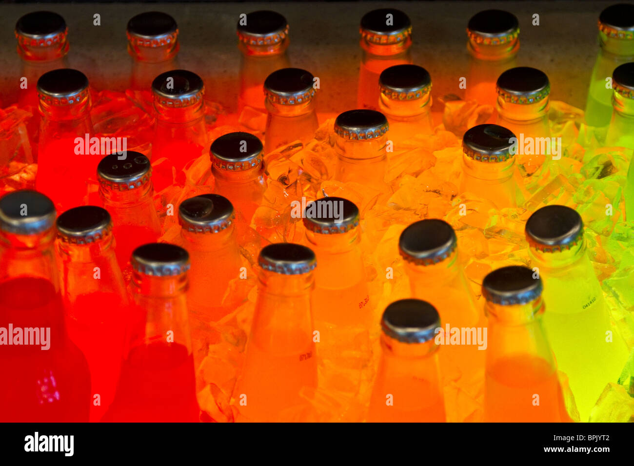 A colorful, colourful, collection of glass soda pop bottles,soft drinks ...