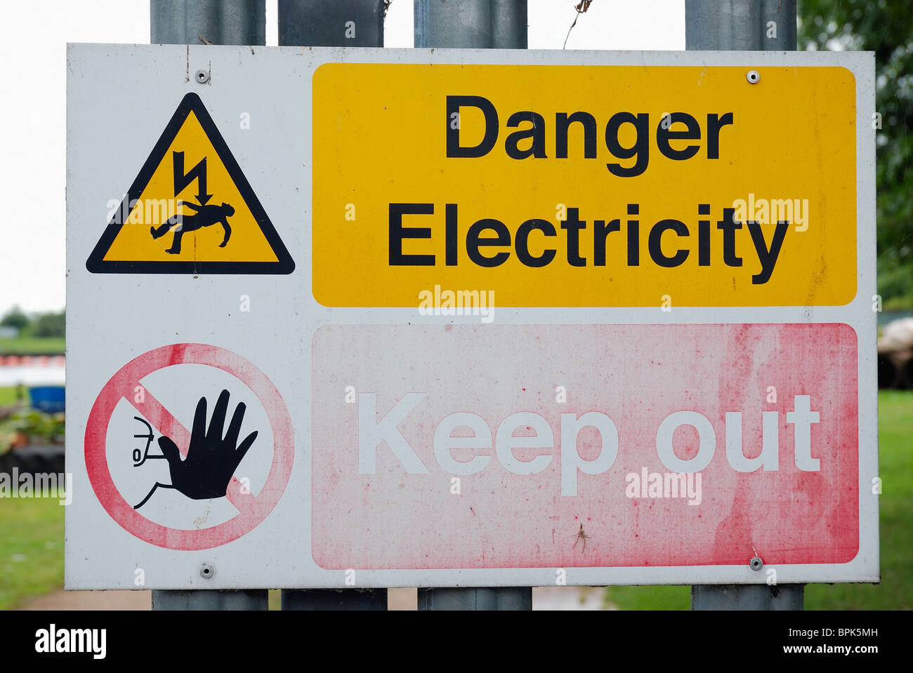 warning sign on gate Stock Photo - Alamy