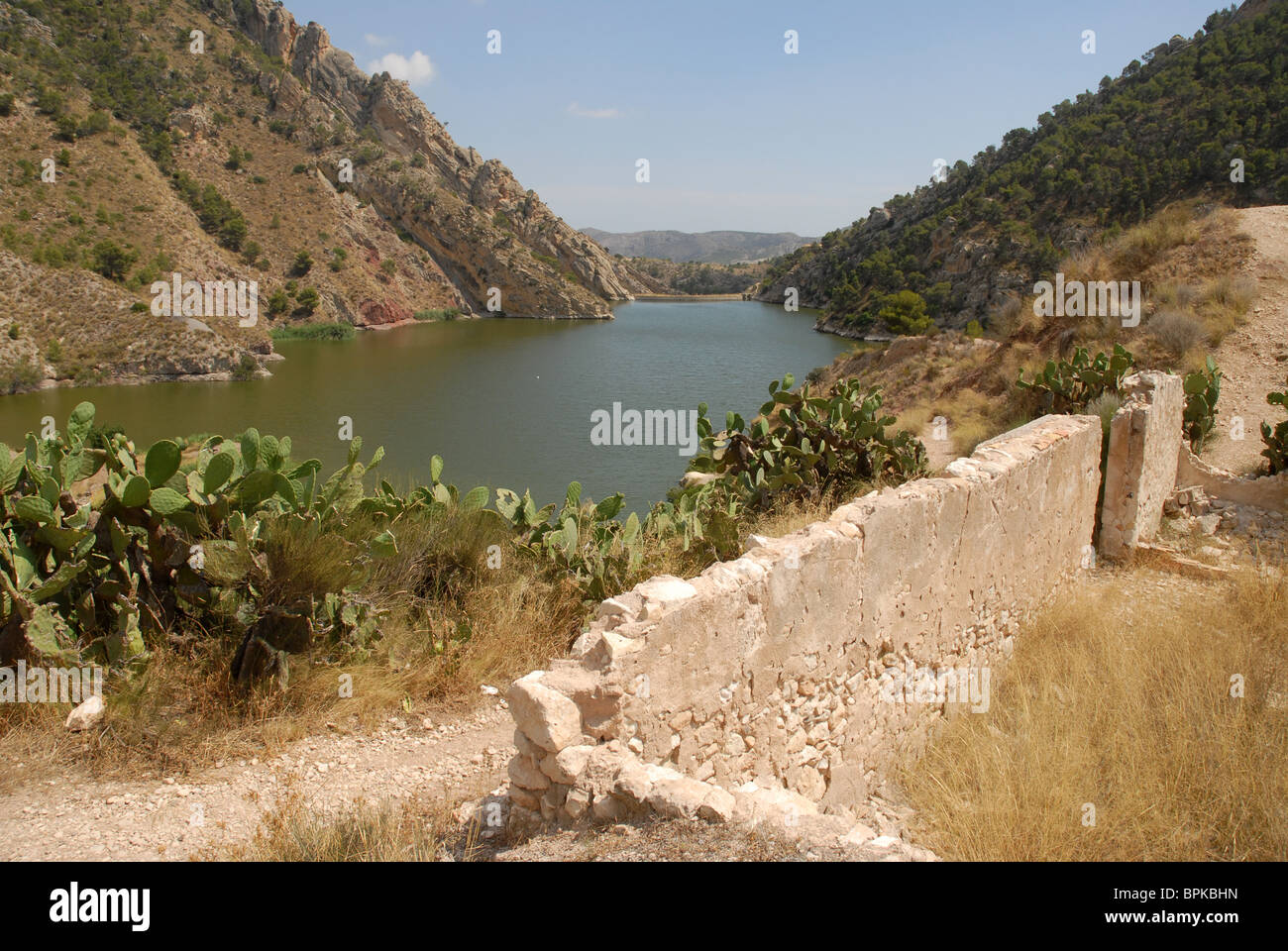ruin and view of Pantano de Tibi (reservoir and dam) Tibi, Alicante ...