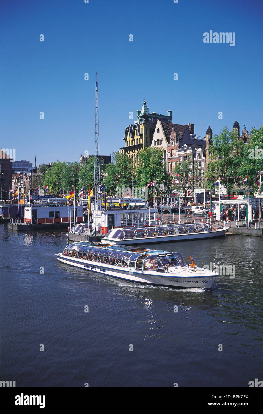 Boat in the canal of amsterdam hi-res stock photography and images - Alamy