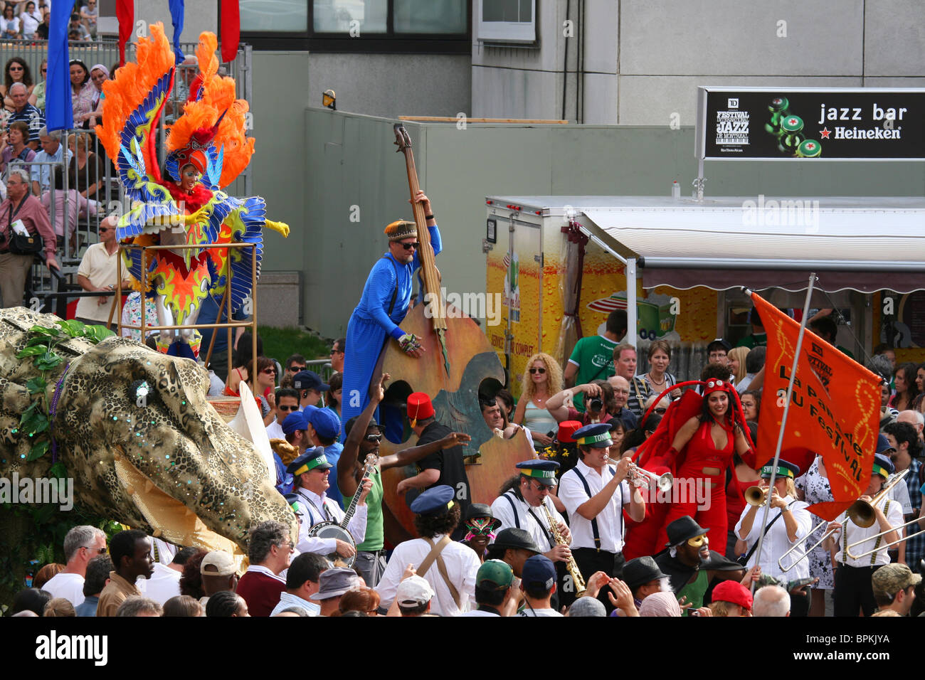 The Montreal International jazz festival daily parade in front of Place ...