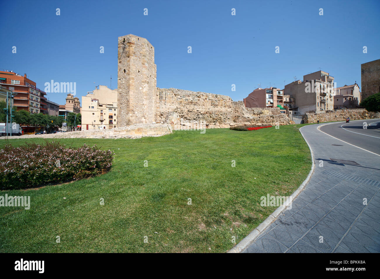 Tower of the era of ancient Rome in the modern urban landscape of ...