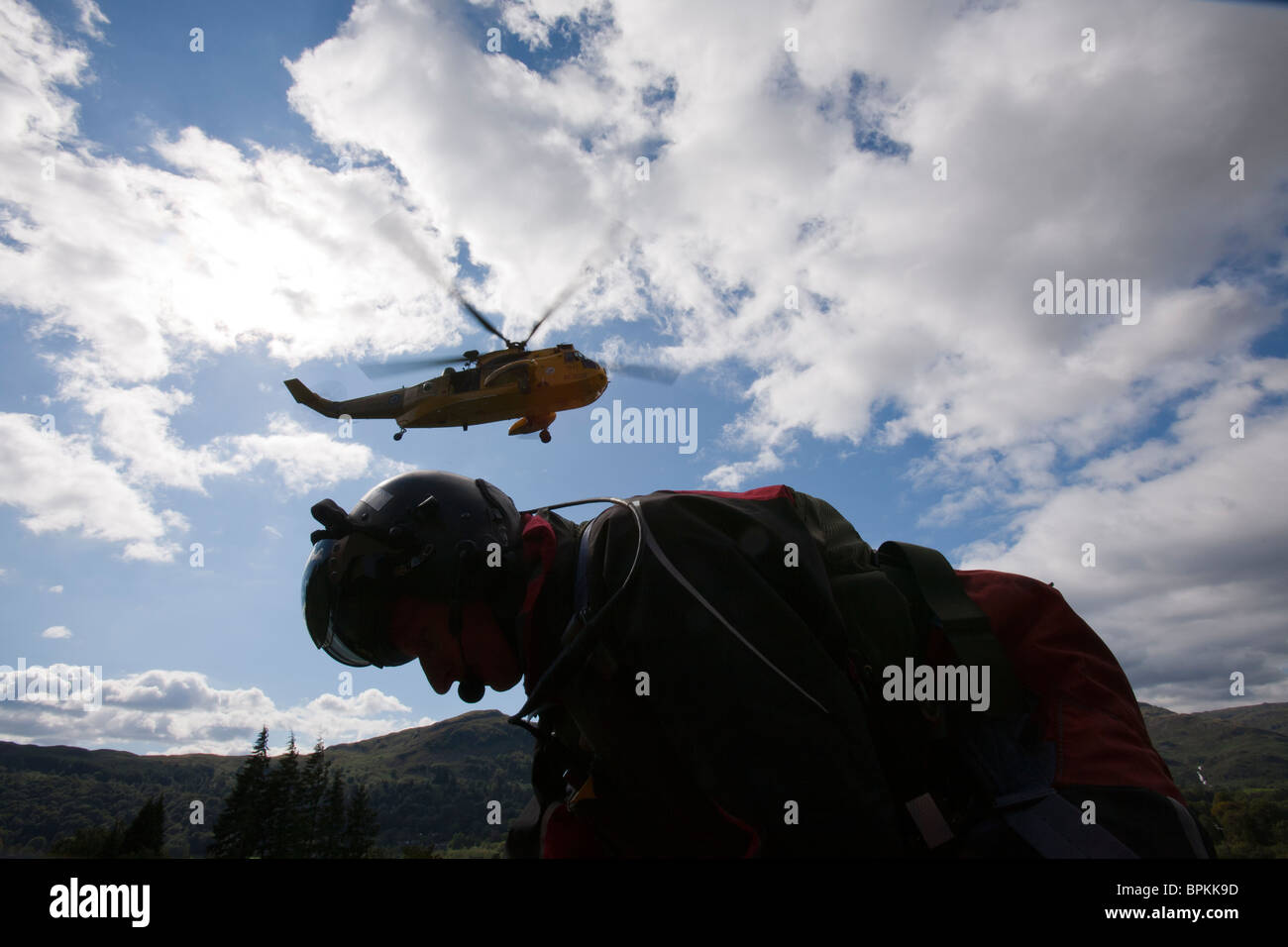 An RAF Sea King Helicopter and Whinch man land at a casualty site to ...