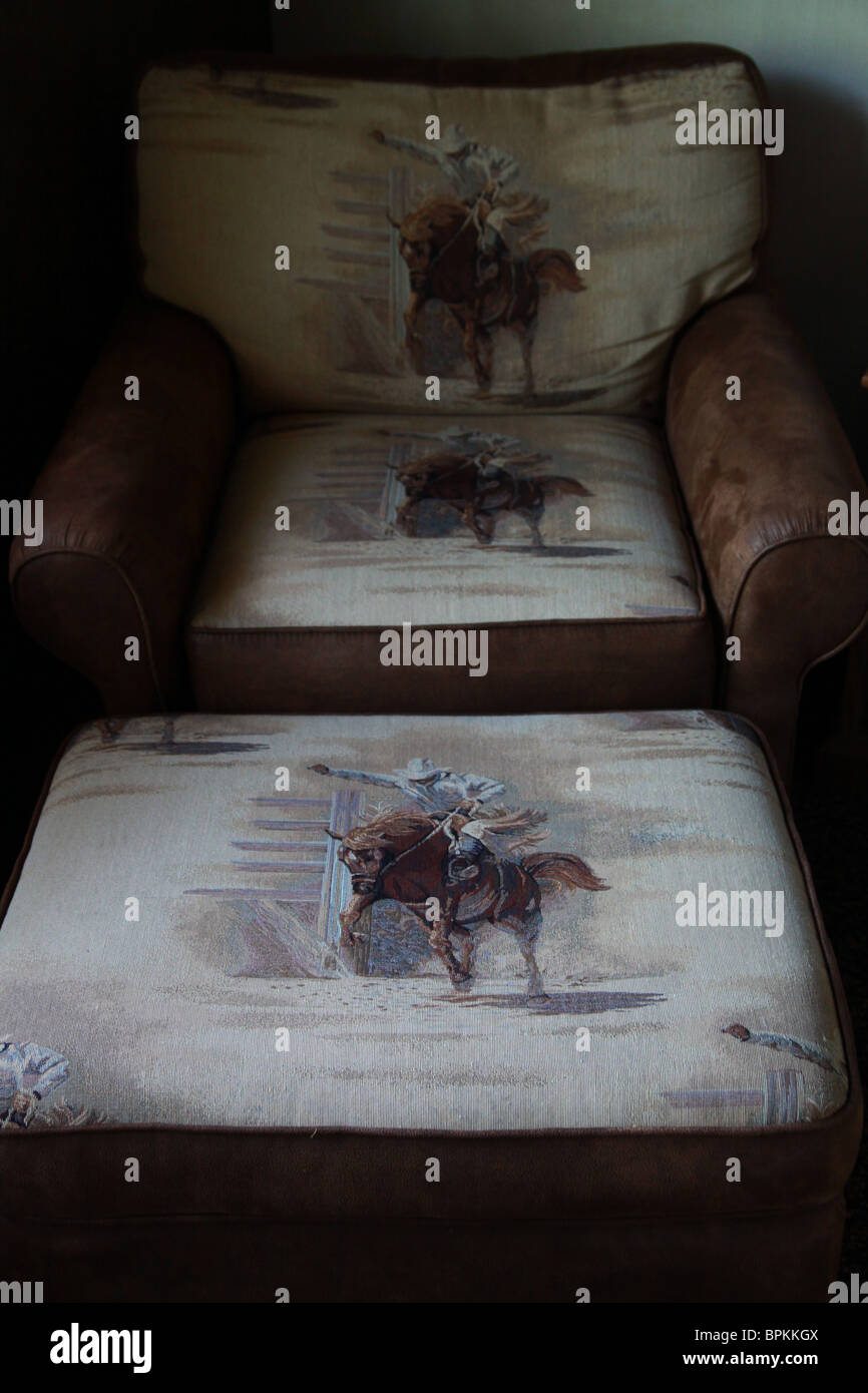 A chair with pictures of cowboys on it Stock Photo - Alamy