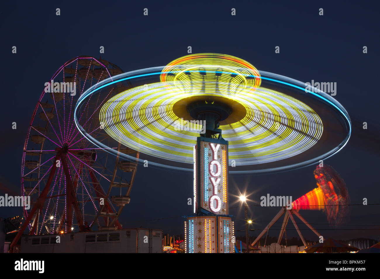 The colorfully illuminated Yo Yo spins in front of the Gentle Giant ...