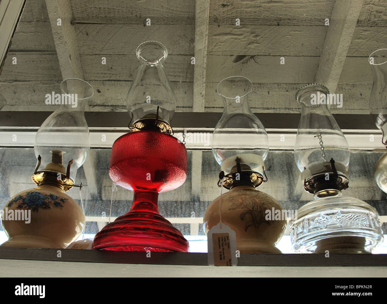 oil lamps kerosene with glass tops of different sizes in red ceramic ...