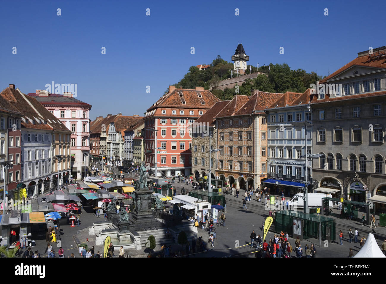 Main square and the remains of the castle on Schlossberg with the ...