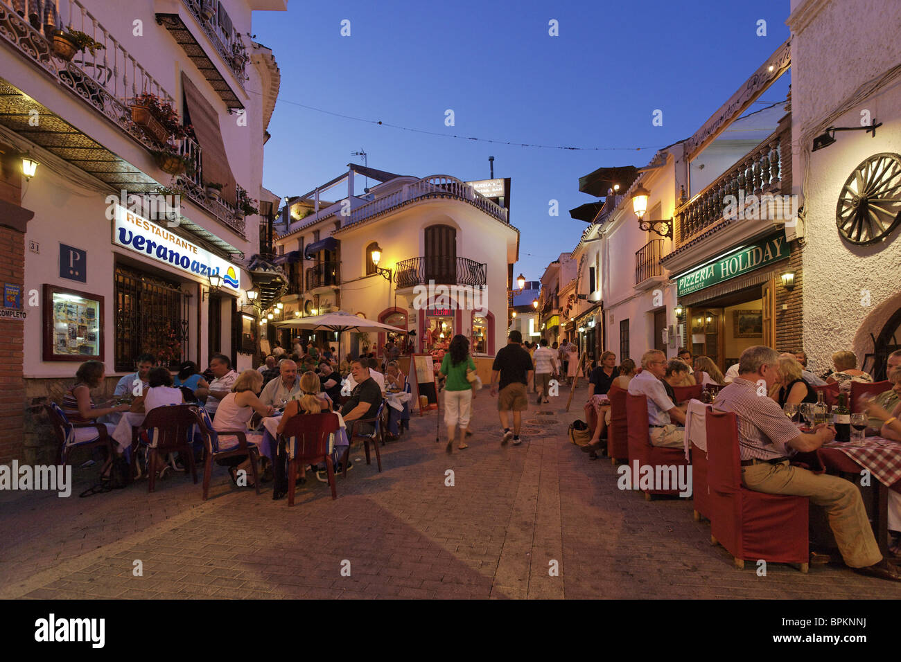 Guests in restaurants in Old Town in the evening, Nerja, Andalusia ...