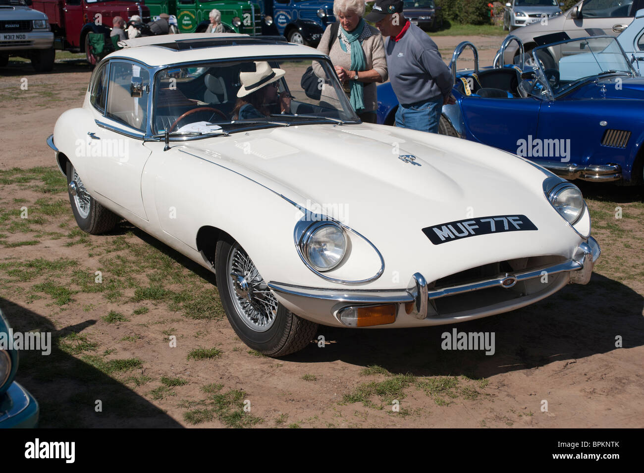 People enjoying a classic car show at the Lizard in Cornwall. Bank ...
