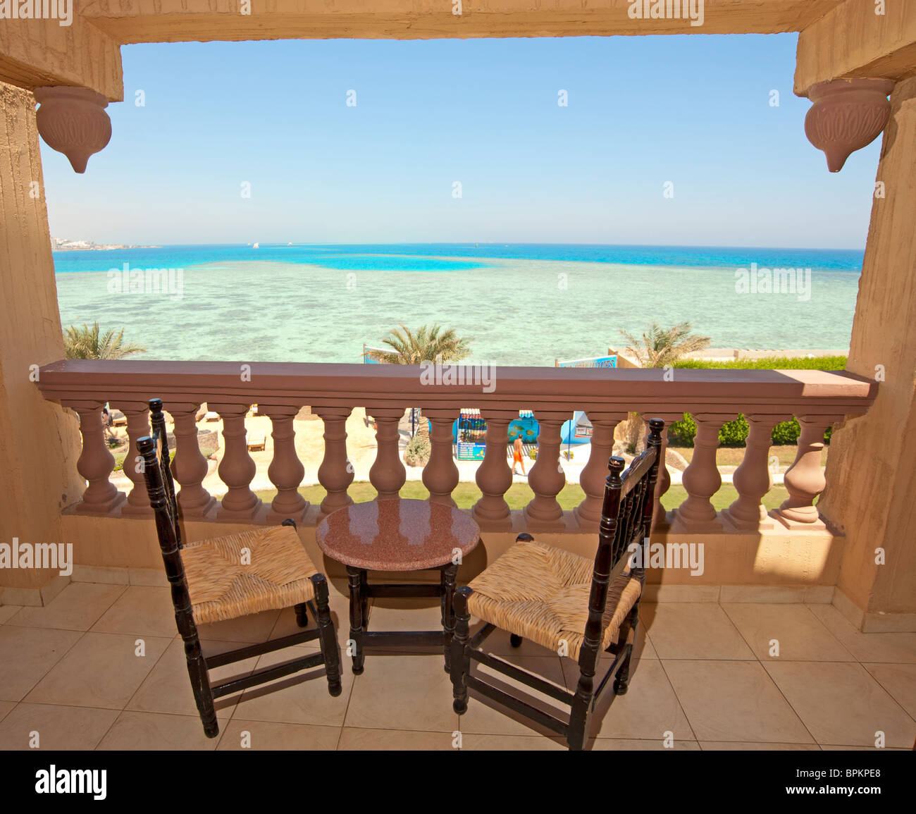 View from the balcony of a luxury hotel in a tropical resort showing ...