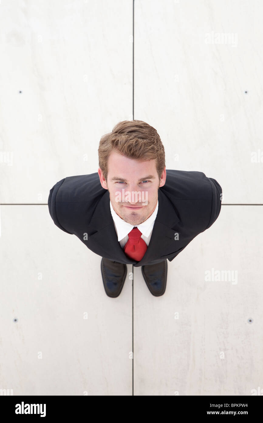 Looking down on a smiling businessman Stock Photo - Alamy