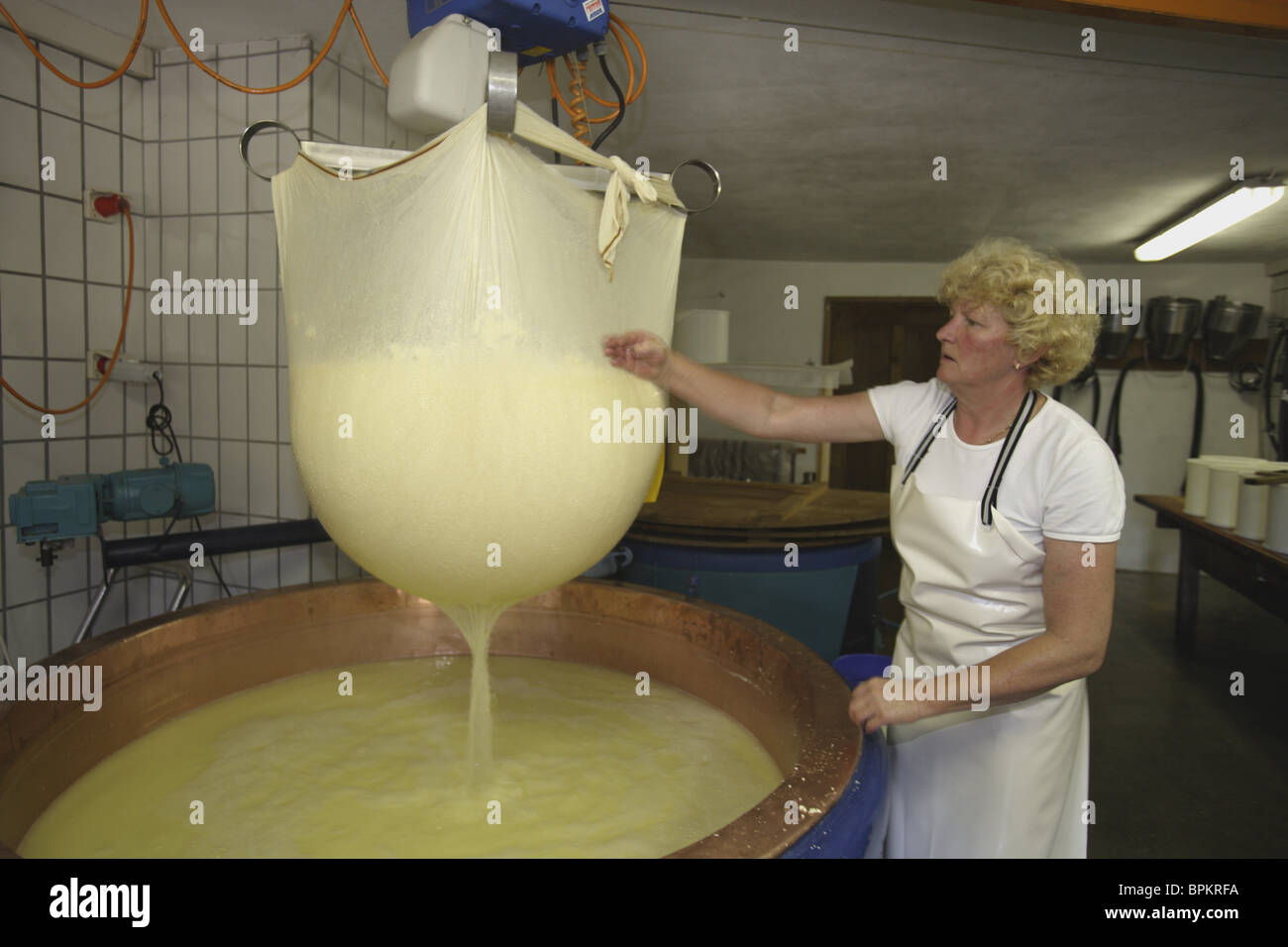 Producing cheese at the Laufbichl Alpe alpine dairy, Hintersteiner Tal ...