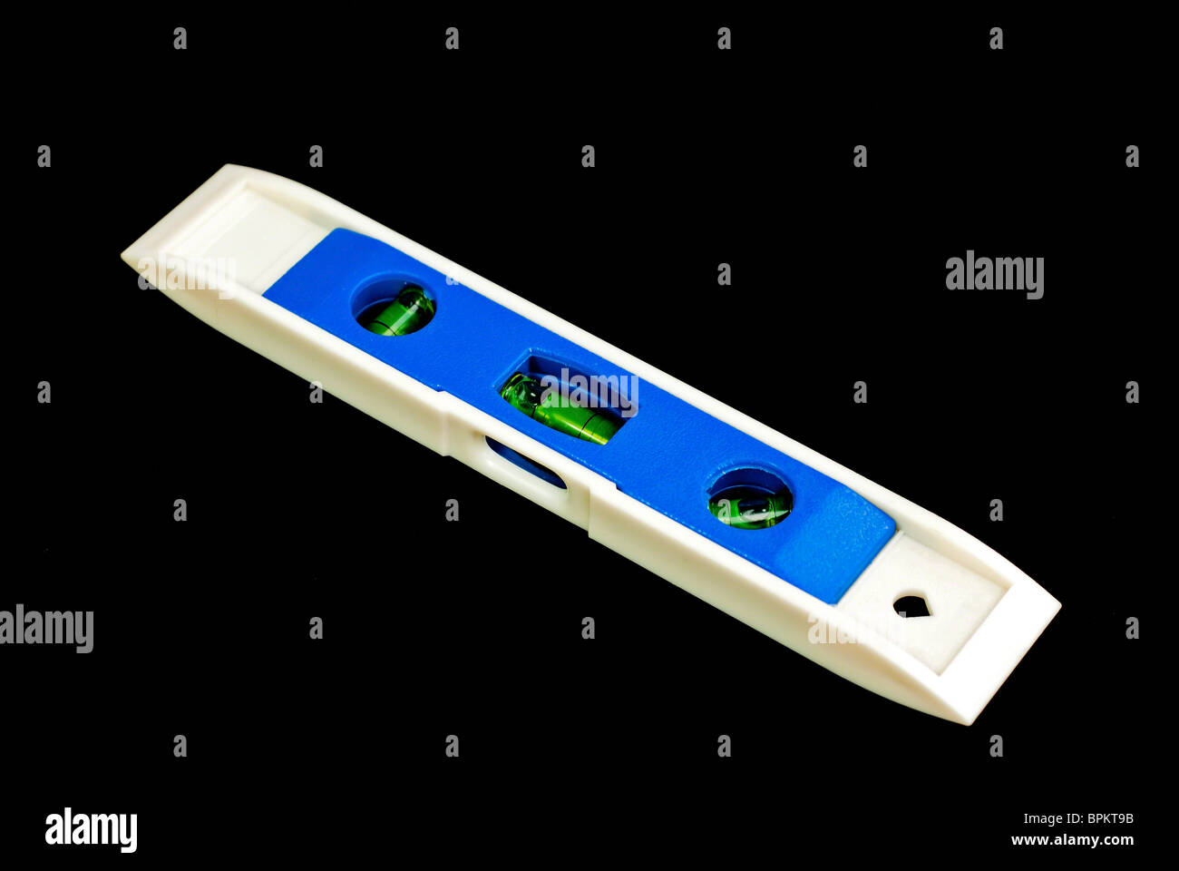 Small plastic white and blue spirit level tool - isolated on white ...