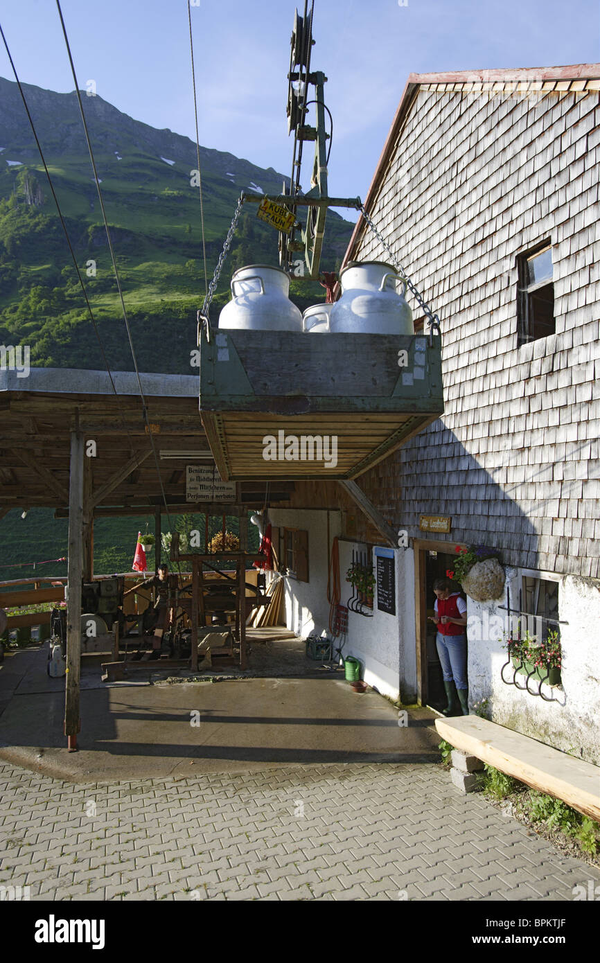 Transporting milk by cable car, Laufbichl Alpe alpine dairy ...