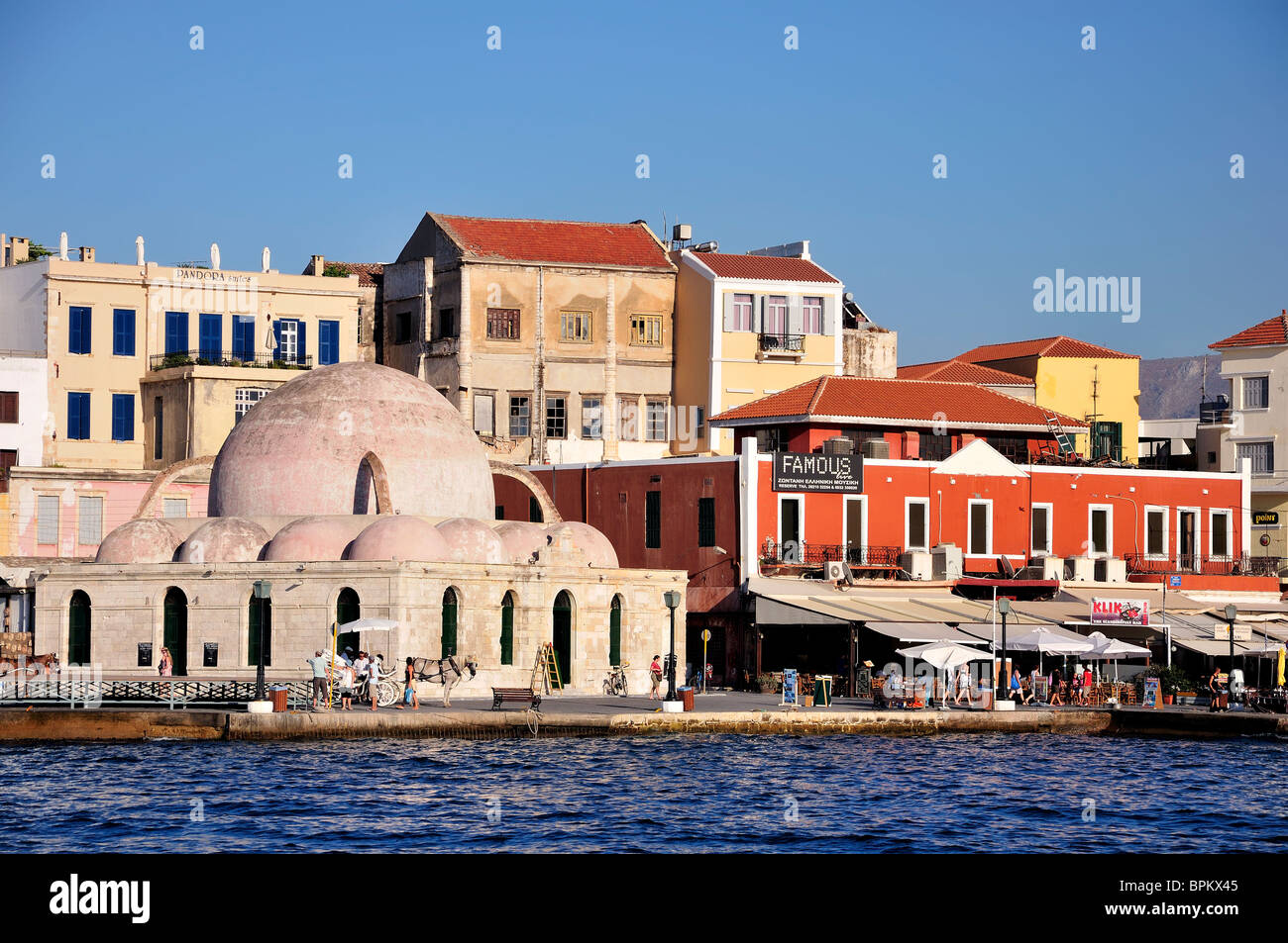 Traditional buildings and Turkish baths at the old port of Chania ...