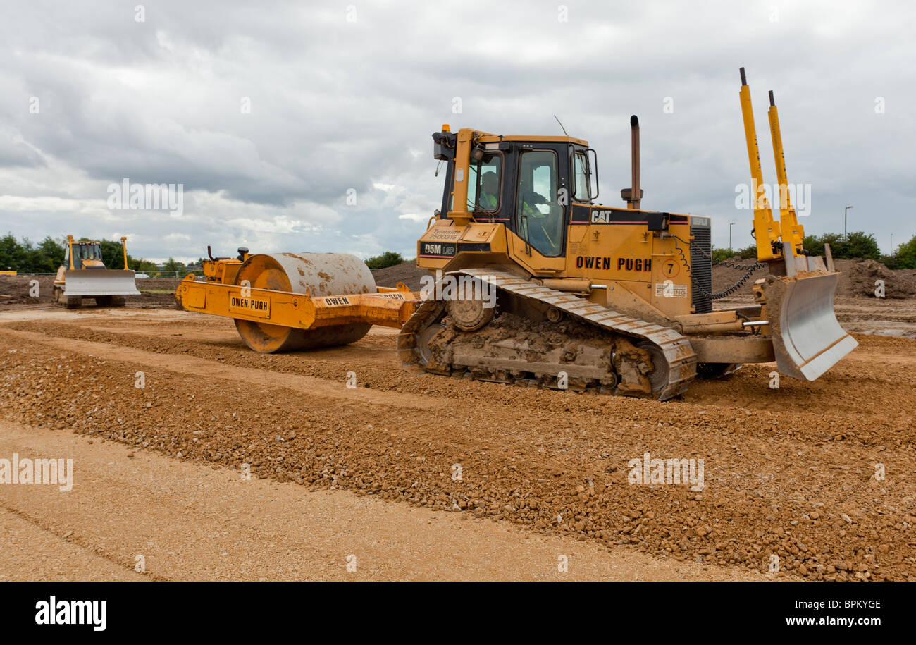 Heavy plant working on ground works Stock Photo - Alamy