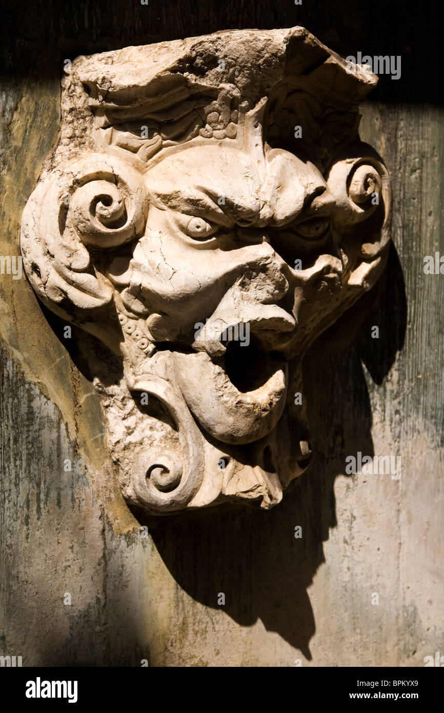 A grotesque sculpture in the grounds of the Castelo de Sao Jorge in ...