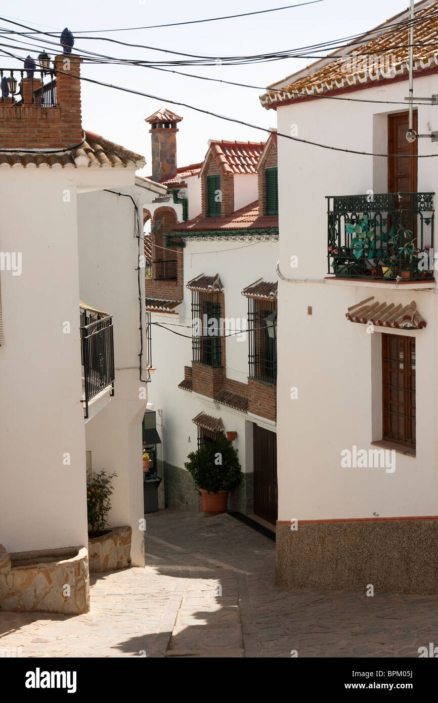 Narrow streets in the small hilltop village of Comares in Spain Stock ...