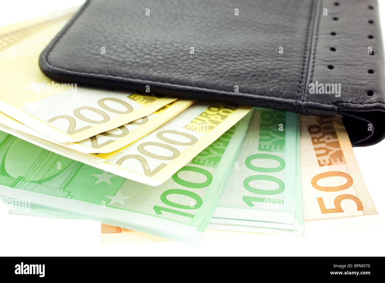 black leather wallet with euro notes on white background. horizontal ...