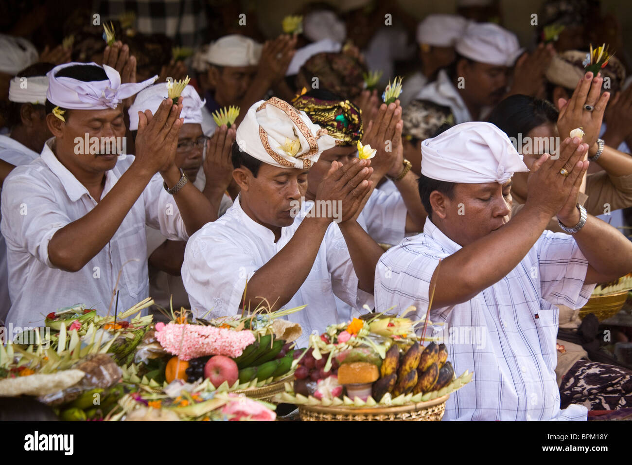 Religious practitioners pray during a ceremony in Bali Indonesia Stock ...